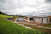 cutted-stone-wall-beside-brownhouse_Northscape | Northscape